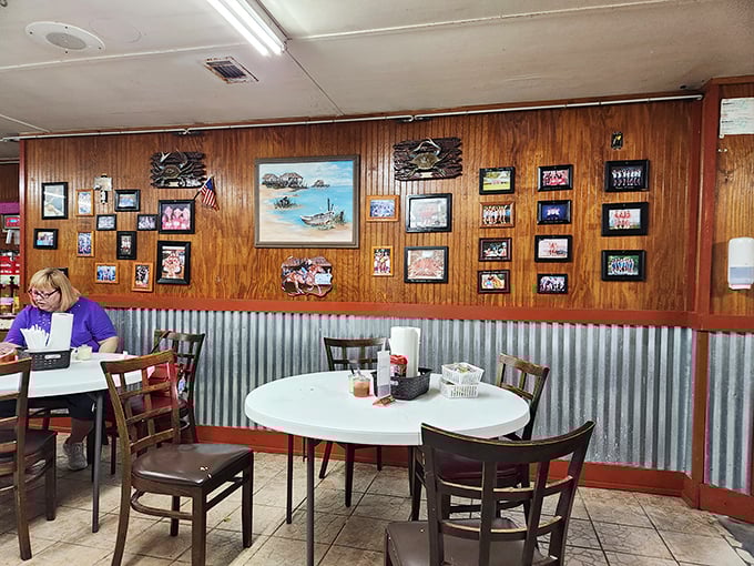 Wood paneling and maritime memories create the perfect backdrop for serious seafood conversations.