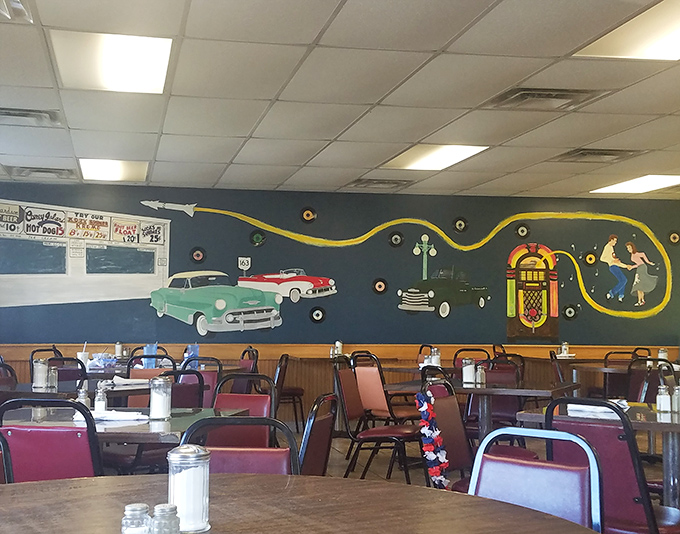 Nostalgia served fresh daily with vintage murals depicting classic cars and jukeboxes. This isn't decoration—it's a time machine.