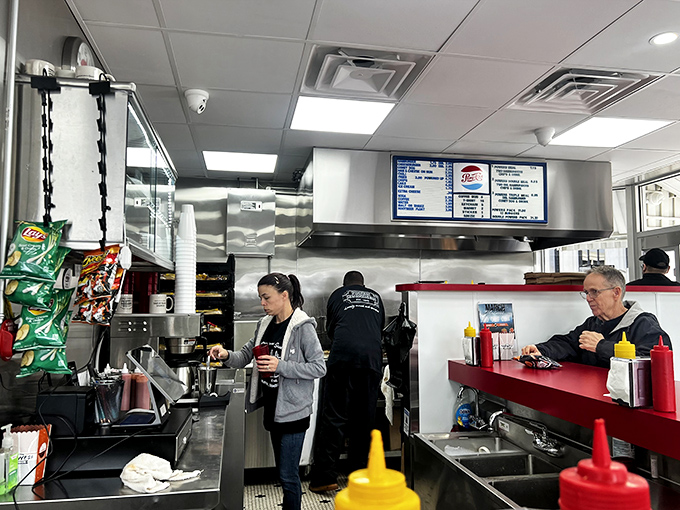Inside Powers, the kitchen ballet unfolds before your eyes&mdash;spatulas flying, onions sizzling, and hungry patrons perched at the counter watching the magic happen.