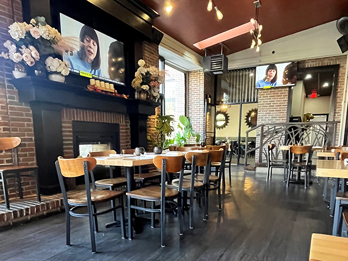 Exposed brick meets Edison bulbs in this cozy space where every table tells a story of satisfied diners.