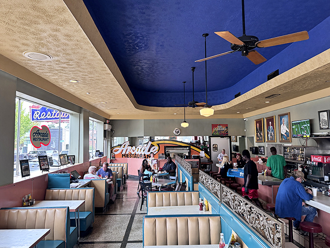 Step inside and the blue ceiling hovers above like a Tennessee sky, while tan booths invite you to slide in and stay awhile.