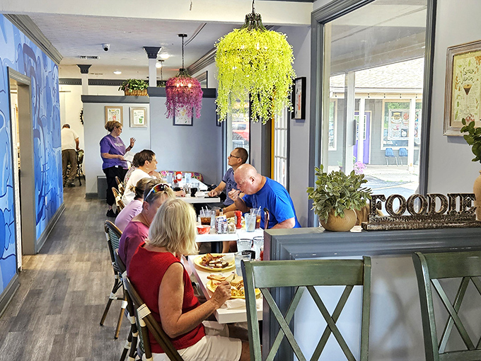 Step into this cozy haven where colorful chandeliers dance overhead and breakfast dreams come true.