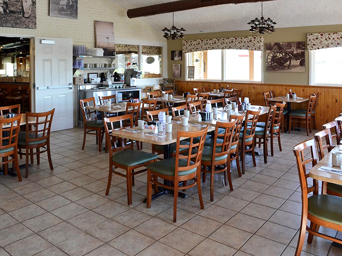 Wooden paneling and simple tables create the perfect backdrop for breakfast drama to unfold. No fancy lighting needed when the food steals the spotlight.