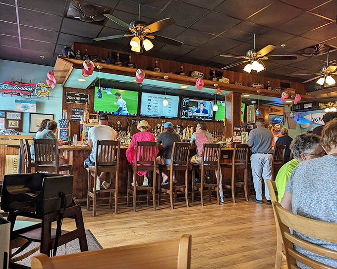 The bar at Woody's buzzes with the energy of summer memories in the making, where cold drinks and crab cake dreams come together.