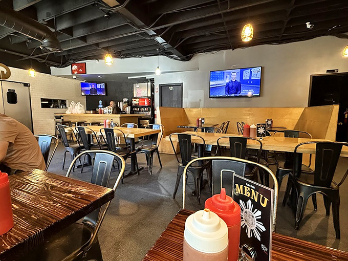 Industrial chic meets Filipino warmth in this inviting dining space. The metal chairs say "urban cool," but the atmosphere whispers "come, stay awhile."