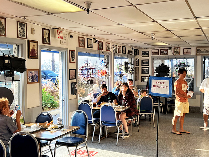 Inside Andria's, nautical nostalgia meets no-nonsense dining. The blue chairs aren't winning design awards, but they're front-row seats to seafood nirvana.