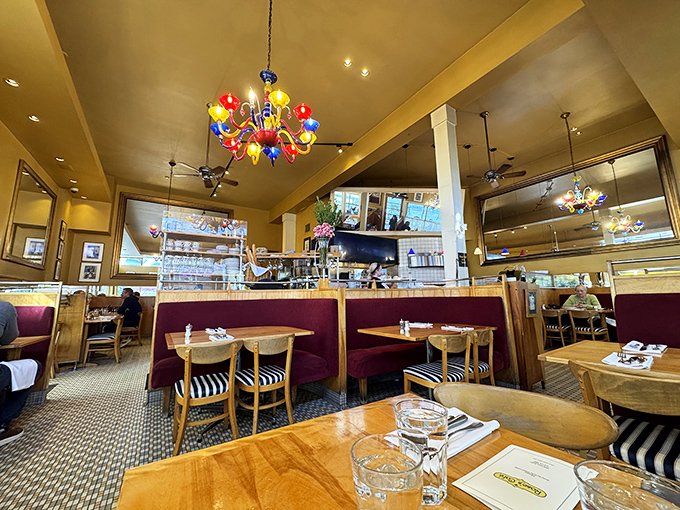 Those multicolored glass chandeliers aren't just lighting fixtures&mdash;they're conversation starters hanging above burgundy banquettes where memories are made and pasta dreams come true.