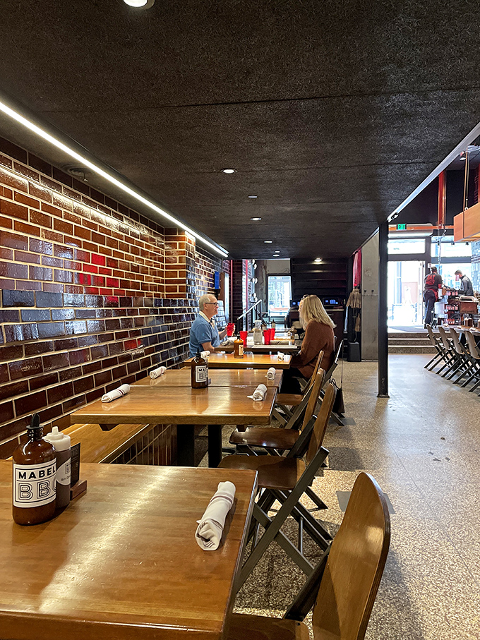 Industrial-chic meets meat temple inside Mabel's, where exposed brick walls and wooden tables set the stage for barbecue brilliance.