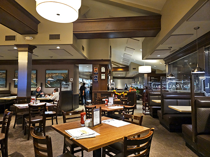 Inside, warm wood tones and soft lighting create that perfect "where everybody knows your name" atmosphere&mdash;minus Norm hogging the best booth.