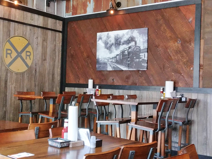 Railroad nostalgia meets comfort food haven. The wooden interior with vintage train photos transports you to a simpler, more delicious time.