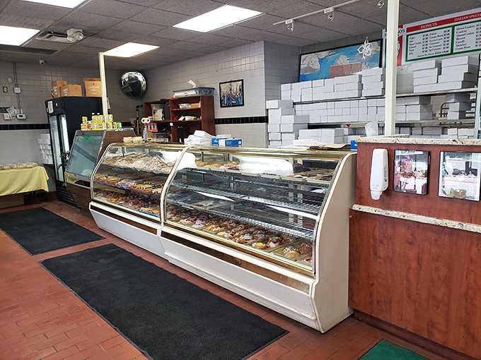 Behind this unassuming counter lies a treasure trove of Italian delights that would make any nonna weep with pride.