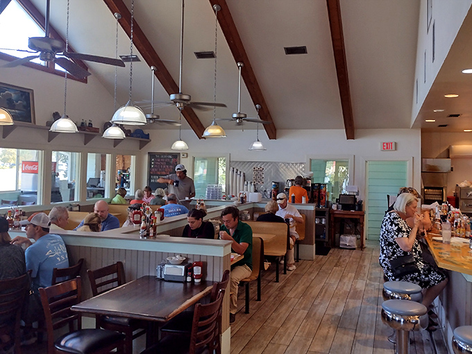 Exposed wooden beams and pendant lighting create that perfect "come as you are" atmosphere where vacation memories are made one bite at a time.