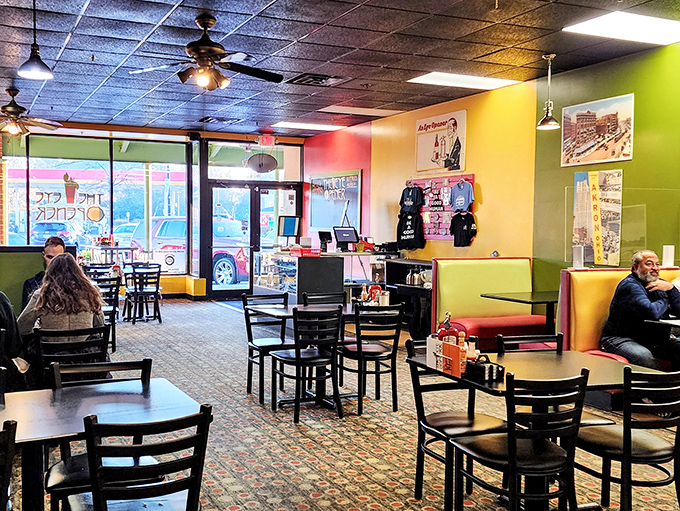 Vibrant yellow and green walls create the perfect backdrop for serious breakfast contemplation&mdash;a colorful canvas for culinary masterpieces.