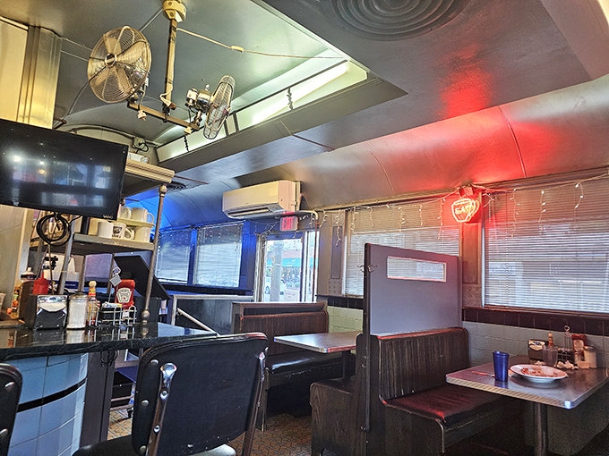 Inside, the curved ceiling and vintage booths transport you to a simpler time when conversations happened face-to-face and coffee refills were unlimited.