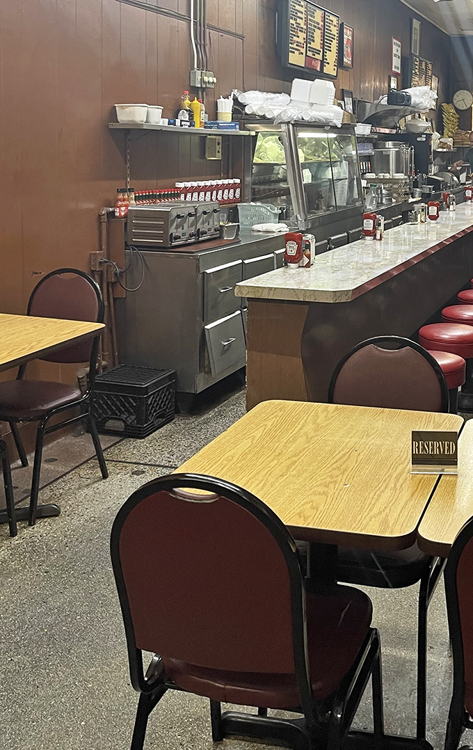 Inside Duly's, time stands wonderfully still. The counter, stools, and no-nonsense tables aren't trying to impress anyone&mdash;they're too busy supporting great food.