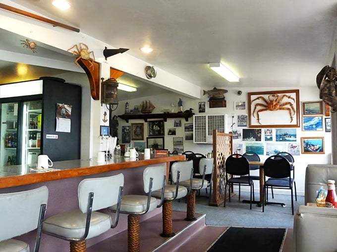 Nautical meets nostalgic inside Gill's, where rope-wrapped counter stools and maritime memorabilia create the perfect backdrop for seafood storytelling.