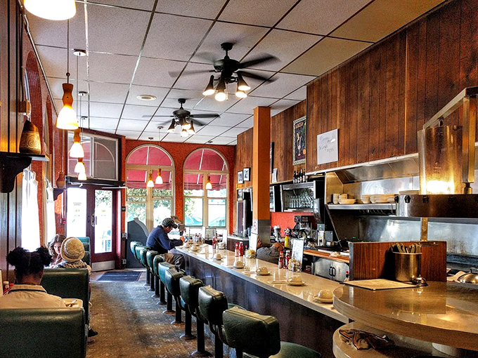 The counter seating offers front-row tickets to the breakfast ballet—where short-order cooks perform their morning magic.