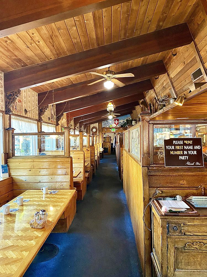 Wooden booths and pine-paneled walls create the perfect mountain cabin vibe&mdash;like dining in a cozy ski chalet without needing to brave the slopes first.