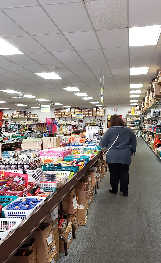 Inside, the treasure hunt begins. Rows of colorful bins and shelves create a maze of possibilities where one person's overstock becomes another's jackpot.