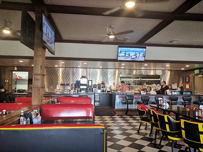 Red vinyl booths, checkered floors, and counter seating &ndash; the diner trifecta that signals you're about to experience something authentically American.