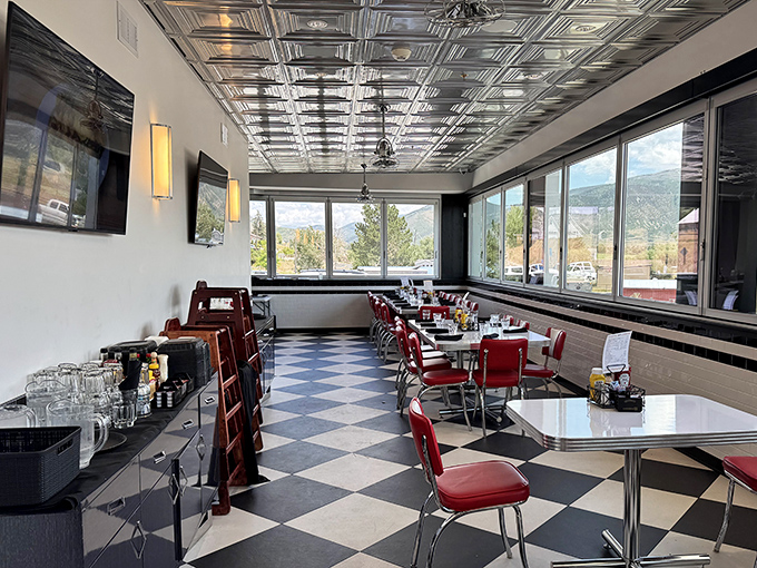 Step inside to a checkerboard floor and cherry-red vinyl seats that'll transport you back to the days when Elvis topped the charts and milkshakes came with two straws.