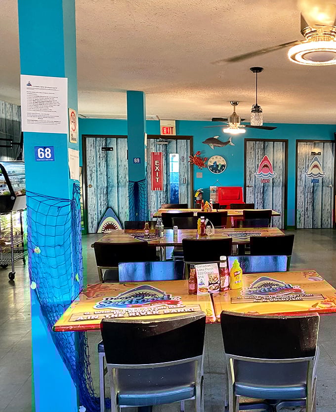 Step inside and it feels like a seaside carnival&mdash;bright walls, playful sharks, and ketchup at the ready.