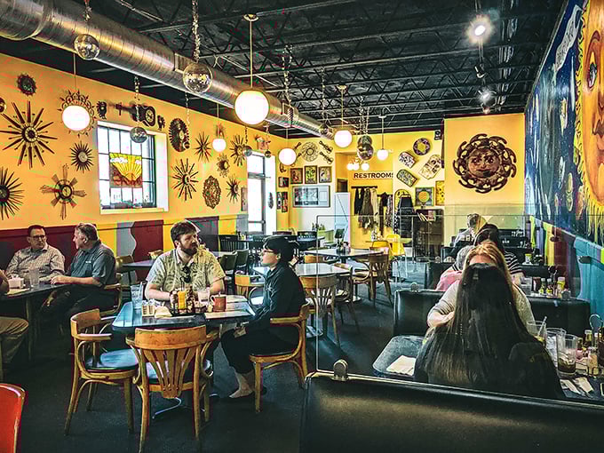 Step inside and suddenly you're swimming in sunshine yellow walls adorned with cosmic art&mdash;like dining inside a supernova with really good coffee.