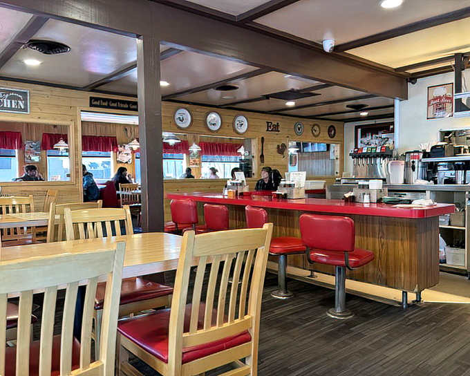 Classic Americana at its finest &ndash; red vinyl stools, wooden counters, and that unmistakable diner energy that promises calories well spent.