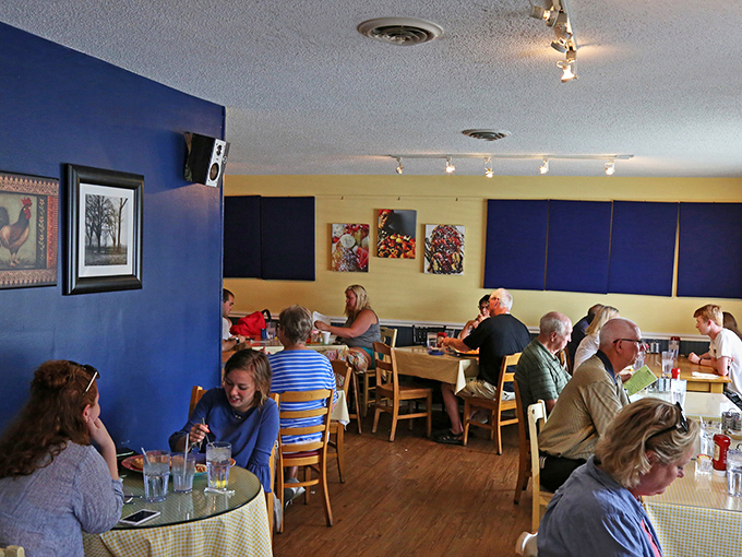 Blue and yellow walls create the perfect backdrop for morning conversations. This isn't just a meal; it's Ohio's breakfast theater.