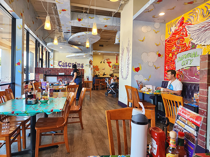 Step inside and the vibrant murals transform an ordinary cafe into a whimsical breakfast wonderland that feeds both stomach and soul.