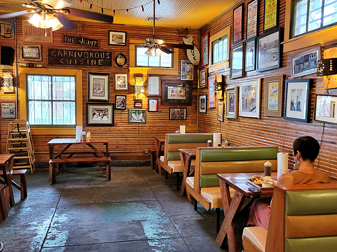 Wood-paneled walls covered in memorabilia tell stories while you eat. That "Carnivorous Cuisine" sign isn't kidding around.