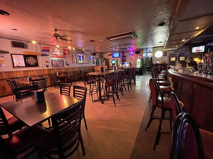 Cozy lighting, wood paneling, and neon beer signs&mdash;this is the kind of bar where stories stretch longer than the night.