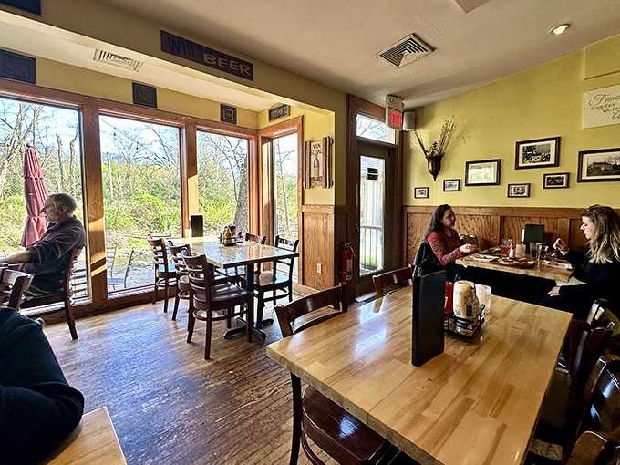 Sunlight streams through windows framing nature's artwork, while diners settle into wooden tables that have witnessed countless "mmm" moments.