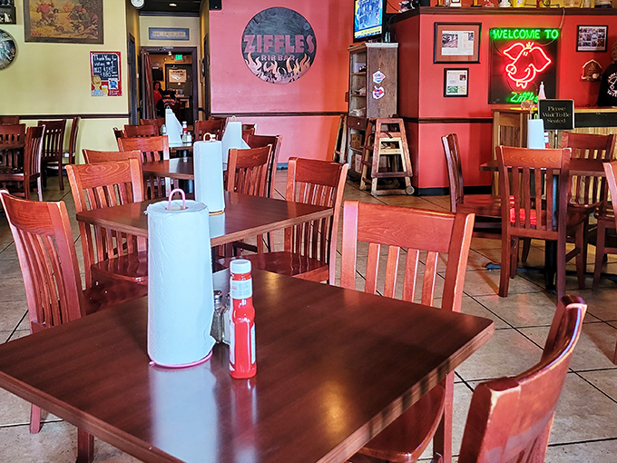 Step inside and the red walls practically announce: "Serious flavor happens here." The wooden chairs have supported countless BBQ enthusiasts on their journey to rib nirvana.