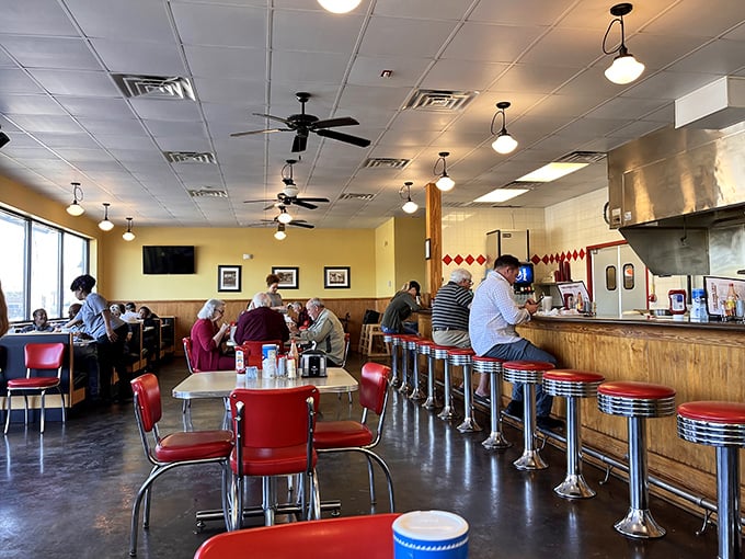 Classic Americana at its finest&mdash;chrome counter stools, ceiling fans, and conversations that matter. This isn't Instagram-bait; it's the real deal.