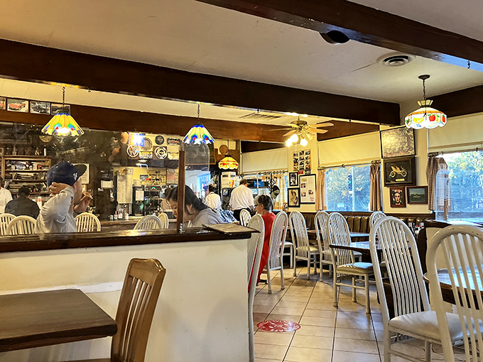 Where Tiffany lamps meet vinyl chairs, and nobody's complaining about the decor budget.