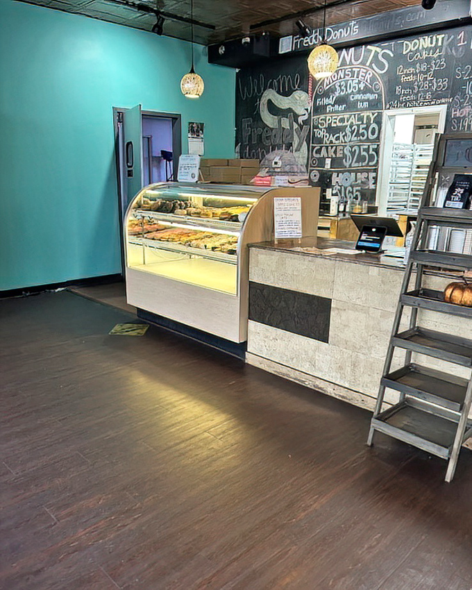 Inside, turquoise walls meet chalkboard menus in a space that prioritizes what matters most&mdash;showcasing those glorious donuts in their natural habitat.