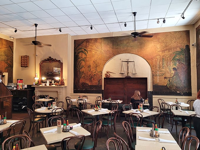 Those murals aren't just decoration&mdash;they're time machines to old New Orleans, watching over diners like culinary guardian angels.