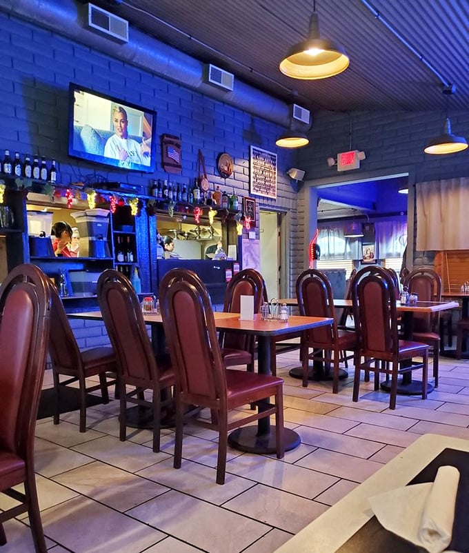 Blue walls and warm lighting create the perfect backdrop for carb-loading without judgment or pretense.