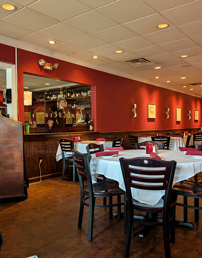 Red walls that make everyone look good, even before the wine arrives – that's Italian hospitality.