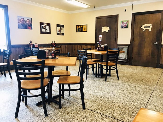 No white tablecloths here&mdash;just honest wood paneling, simple tables, and walls that tell the story of barbecue pilgrims who came before you.