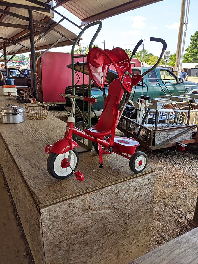 This cherry-red vintage tricycle isn't just transportation&mdash;it's childhood nostalgia on three wheels, waiting to become someone's conversation piece or a lucky kid's chariot.