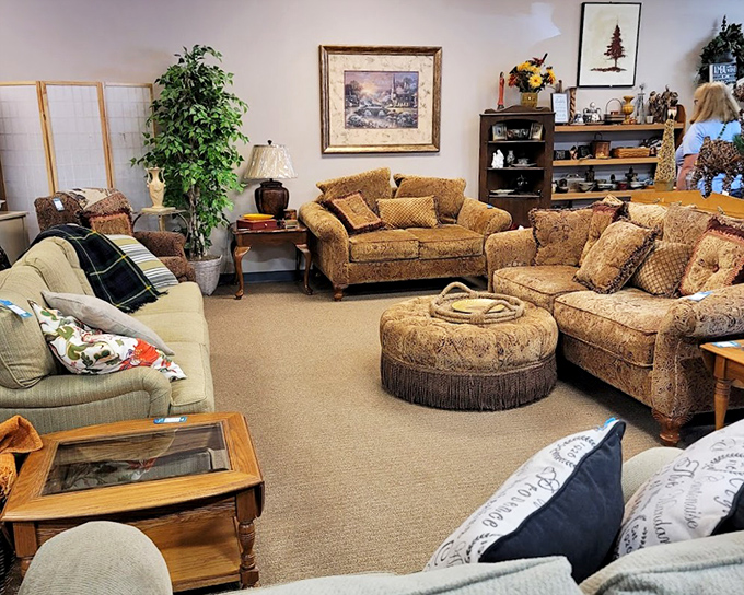 Living room vignettes that could be straight out of a design magazine. That fringe ottoman alone is worth the trip&mdash;someone's grandmother is crying over letting this one go.