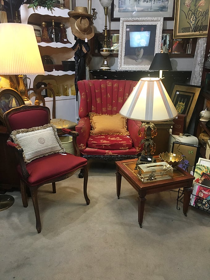 This cozy corner vignette could be straight from your stylish grandmother's living room &ndash; that red channel-back chair practically begging you to sit and stay awhile.