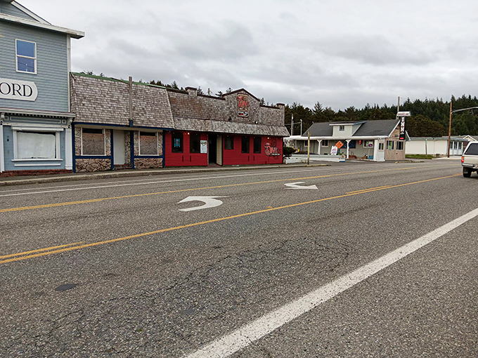 Downtown Port Orford might not scream "metropolis," but that red-fronted building has more character than most city blocks I've encountered. 