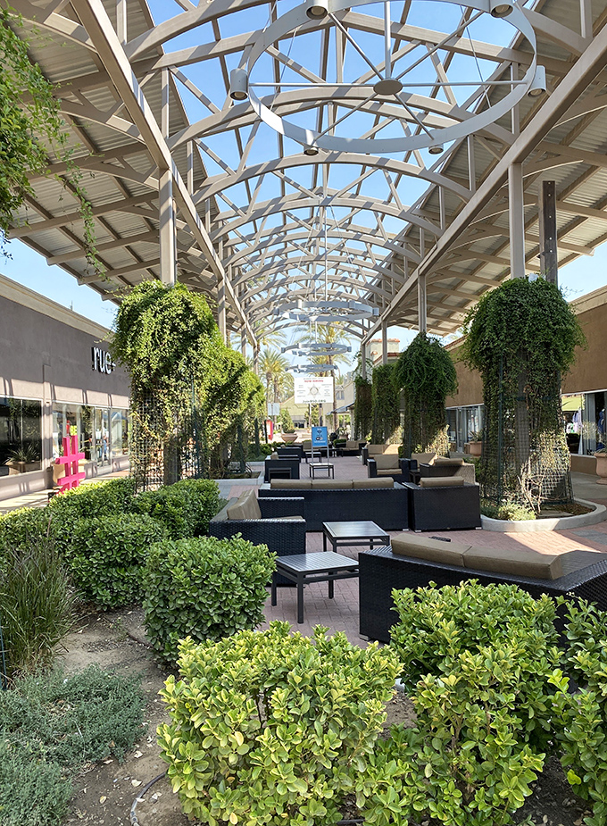 The mall's central lounge area feels like an upscale resort where your only responsibility is deciding which store deserves your attention next.