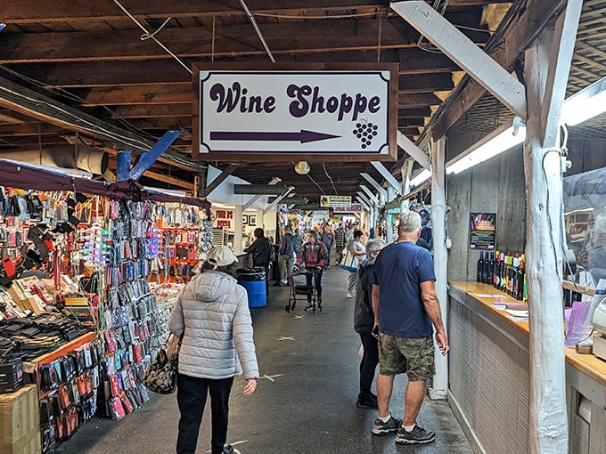 Follow the "Wine Shoppe" sign like it's your North Star. The colorful phone cases to your left are just a bonus detour.