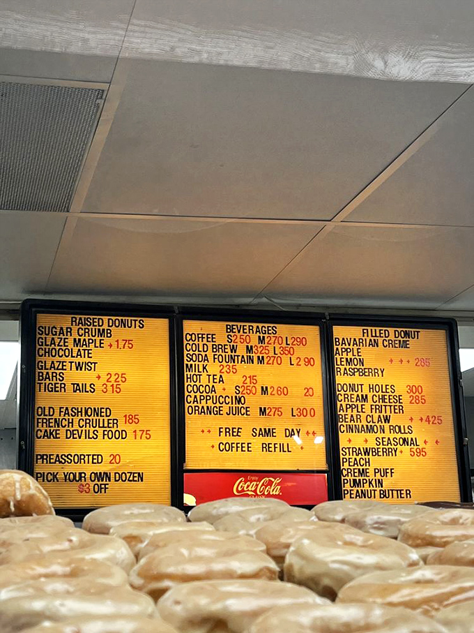 The menu board tells a story of donut dedication &ndash; from classic glazed to seasonal fruit-stuffed treasures that inspire pilgrimages.