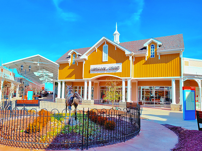 Michael Kors' sunshine-yellow storefront stands out like a designer beacon, promising handbags that cost less than your monthly car payment (but not by much).