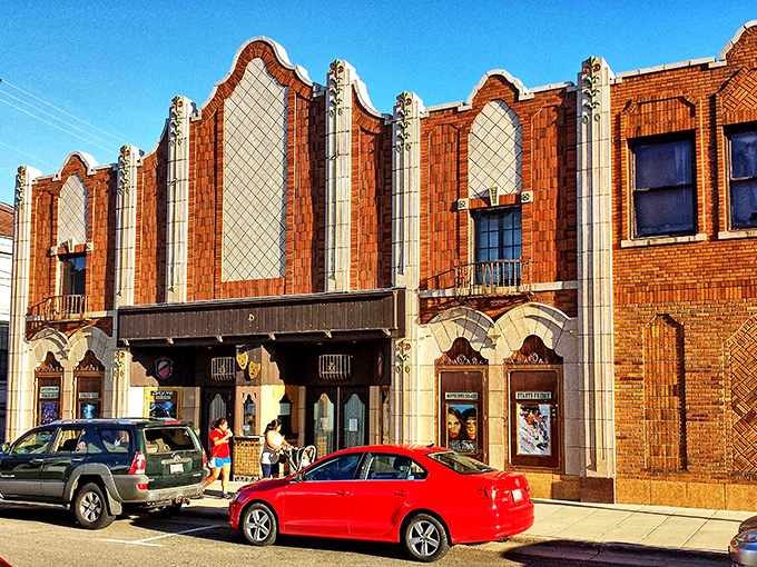 The ornate fa&ccedil;ade of Monroe's historic theater stands as a testament to a time when buildings weren't just structures, but works of art.